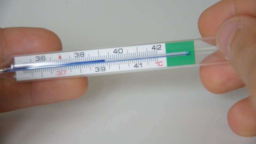 Checking Fever 39 Degrees Celsius With Mercury Thermometer Closeup