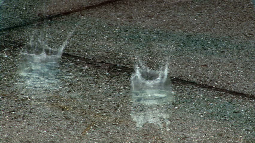Drops Of Heavy Rain Are Hitting Wet Ground Surface. Original Sound ...