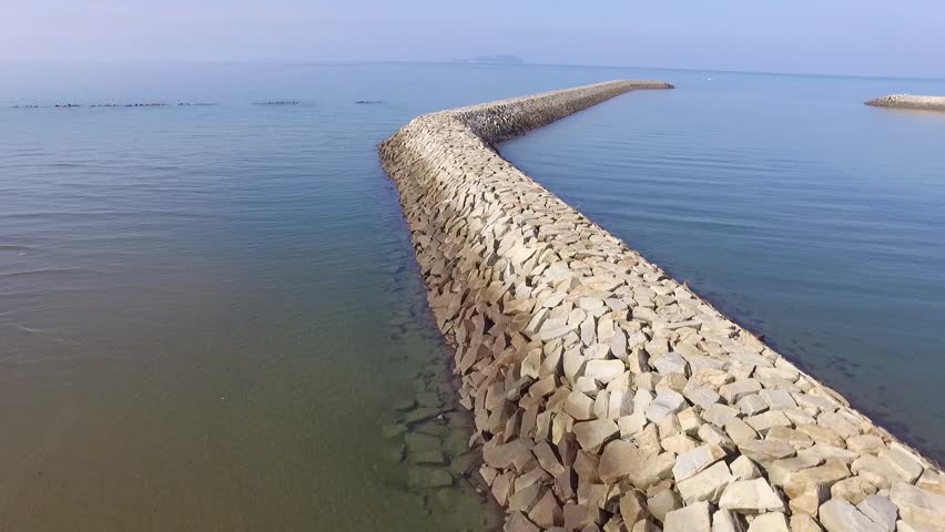 Ocean Waters Are Kept At Bay With Huge Stone Blocks. Stock Footage ...