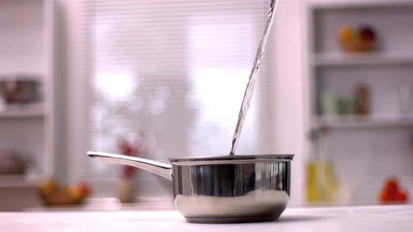 Water Pouring Into Pot In Kitchen In Slow Motion Stock Footage Video ...