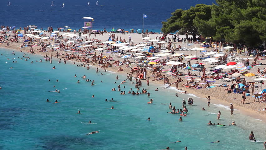 People On The Beach, Sunbathe And Enjoy On Vacation. Summertime At ...