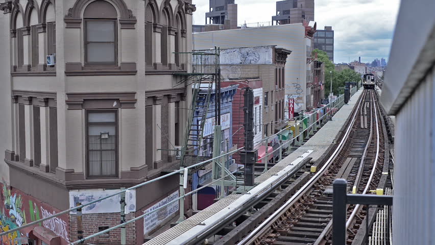 Subway Train Pulls Into Elevated Platform In The Bronx, New York City ...