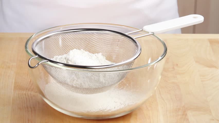 Flour Being Sieved Into A Bowl Stock Footage Video 4232344 - Shutterstock