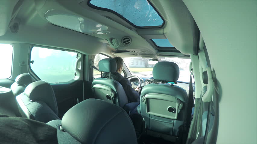 Rear View From Inside Car Person Driving 4K. Inside The Back Of A New ...