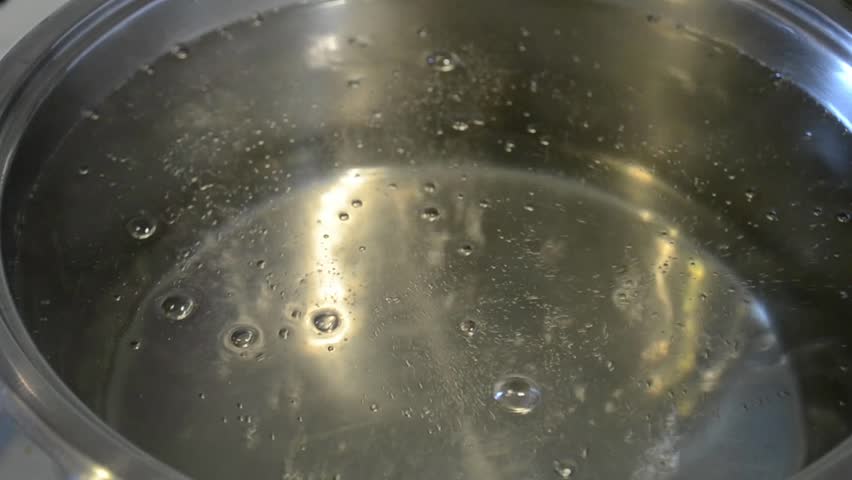 Boiling Water With Bubbles In Close-up. Suitable For Science ...
